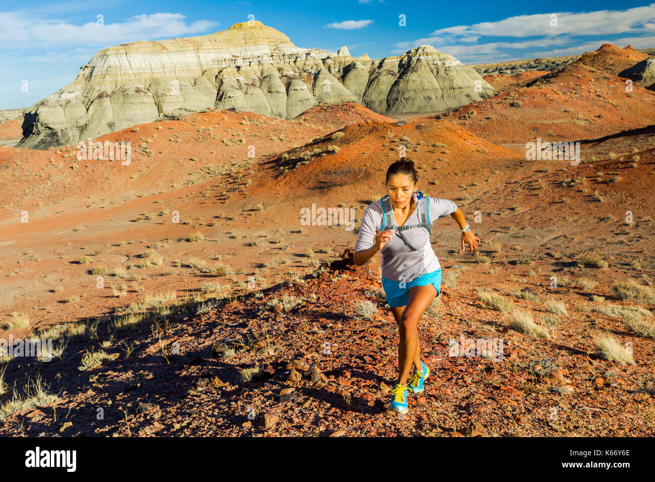 Native American woman running in desert Stock Photo - Alamy