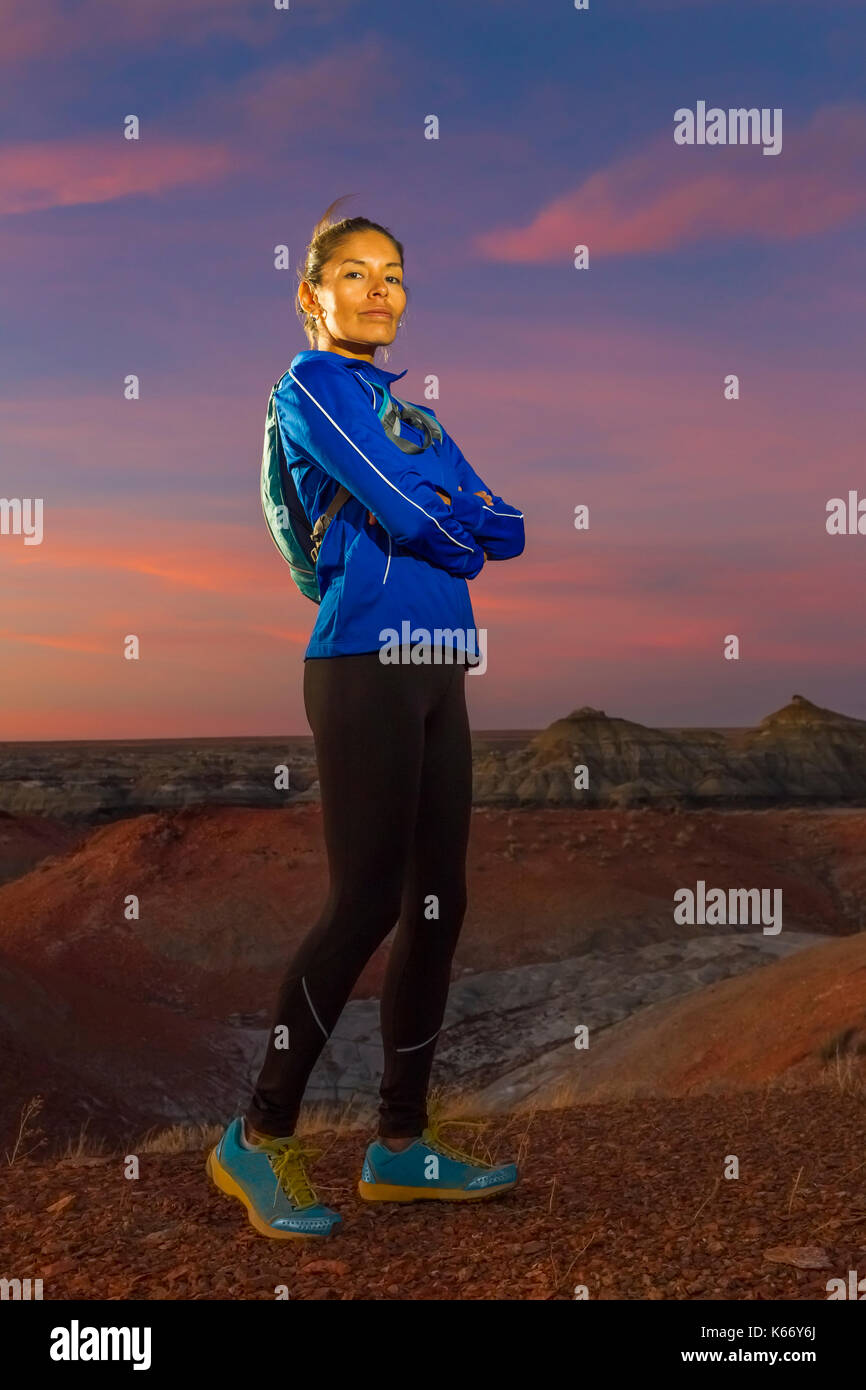Native American woman standing in desert at sunset Stock Photo - Alamy