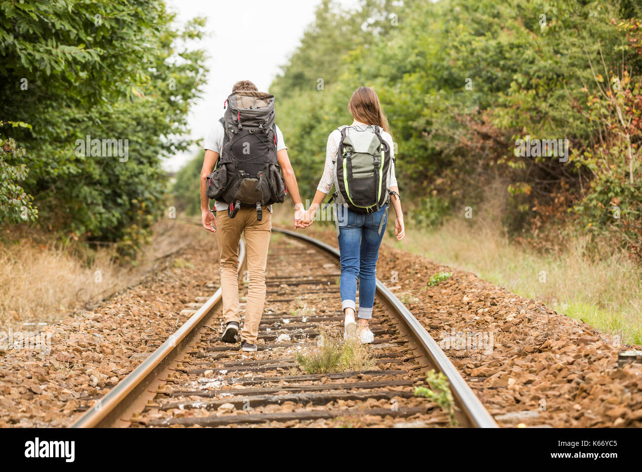 Lady on train tracks hi-res stock photography and images - Alamy