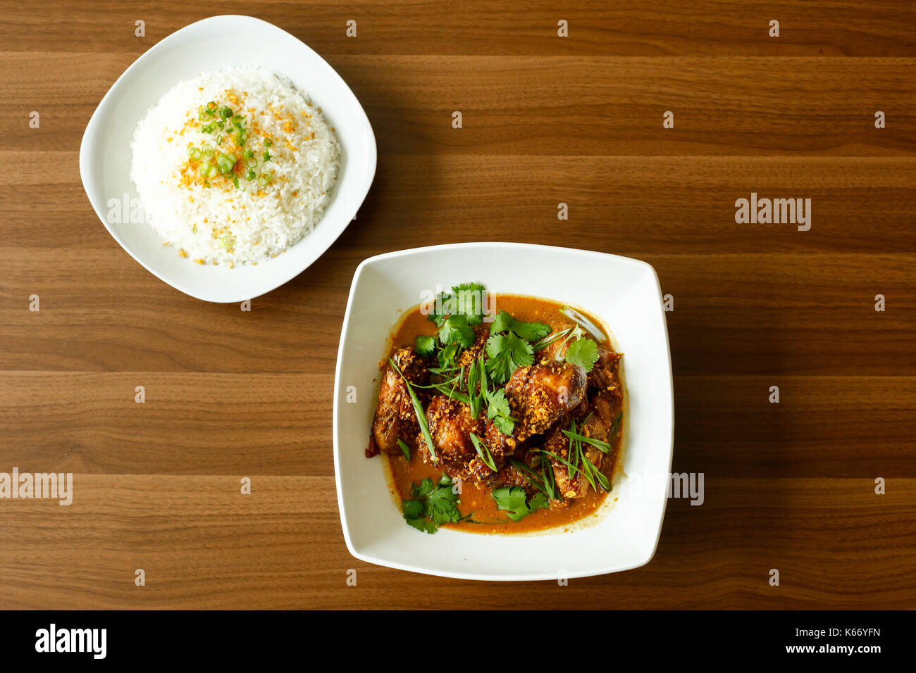 Rice and meat in bowls Stock Photo - Alamy