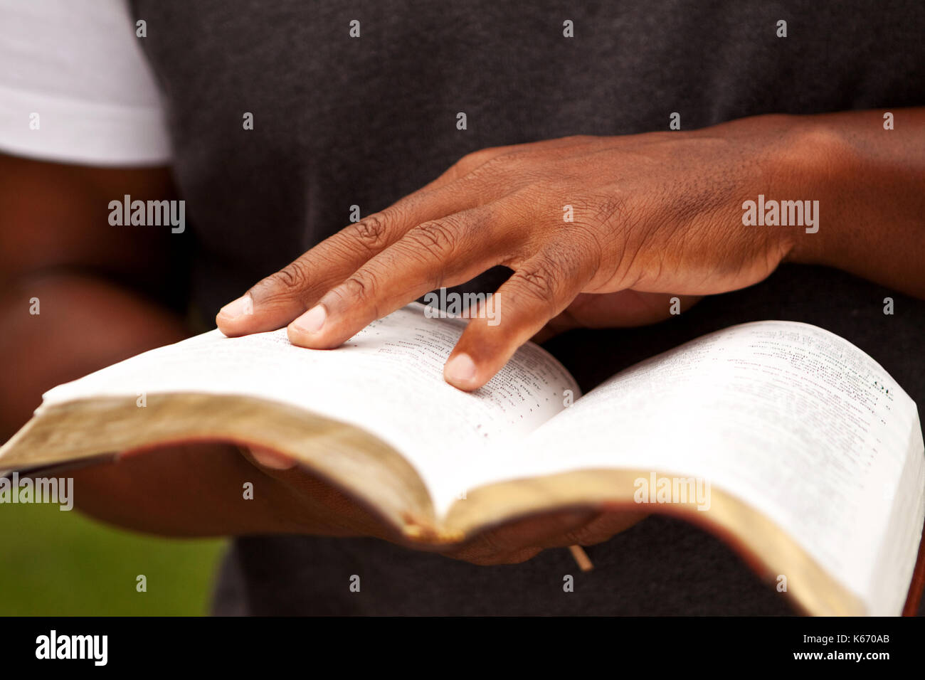 African man reading bible hi-res stock photography and images - Alamy