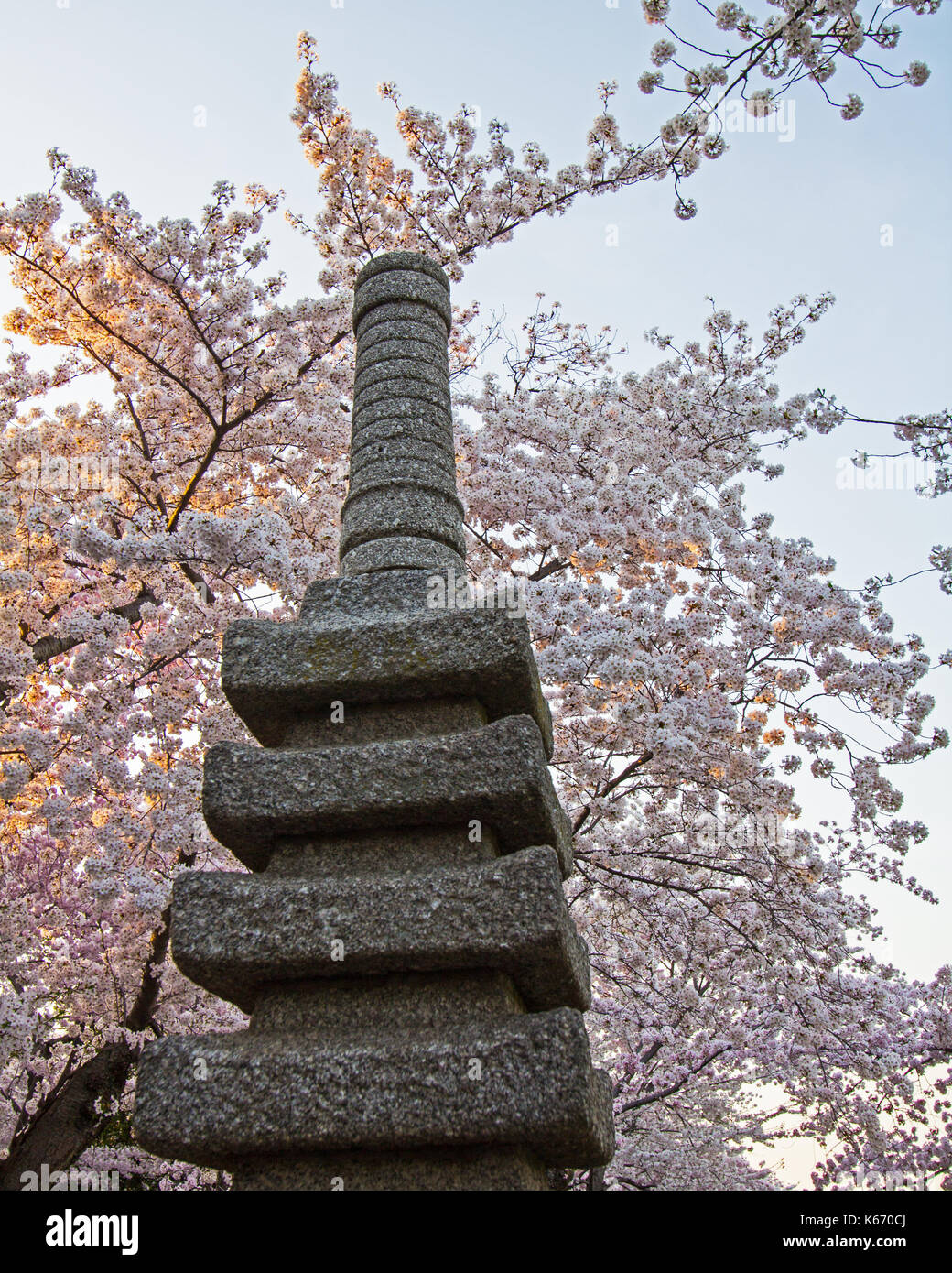 Japanese obelisk in the cherry trees along the reflecting pool near the ...
