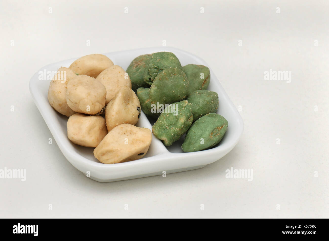 Japanese snacks coated in wasabi green powder Stock Photo - Alamy