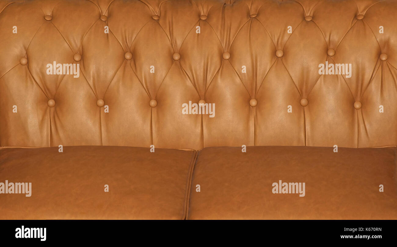 Detail of beige soft leather material sofa upholstery Stock Photo - Alamy