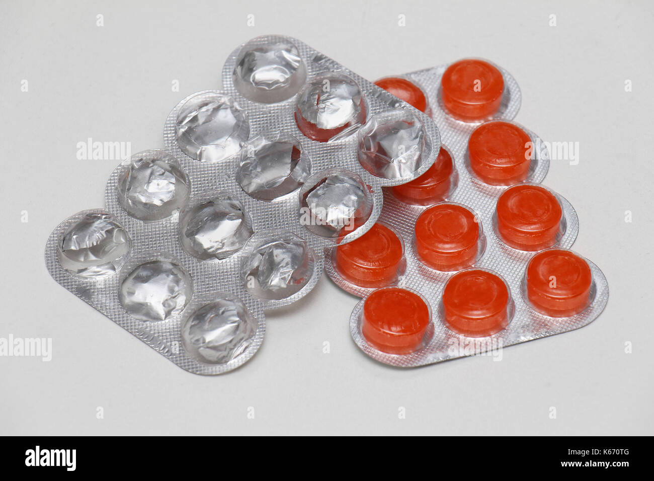 Medical lozenges healing sore throat in plastic blisters Stock Photo ...