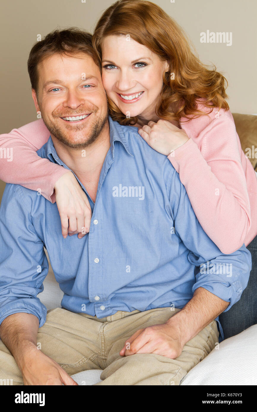 Cute couple smiling Stock Photo - Alamy