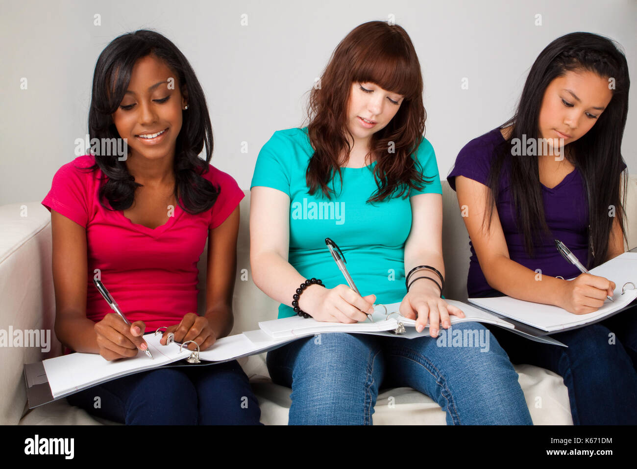 Diverse group of teenagers studing Stock Photo - Alamy