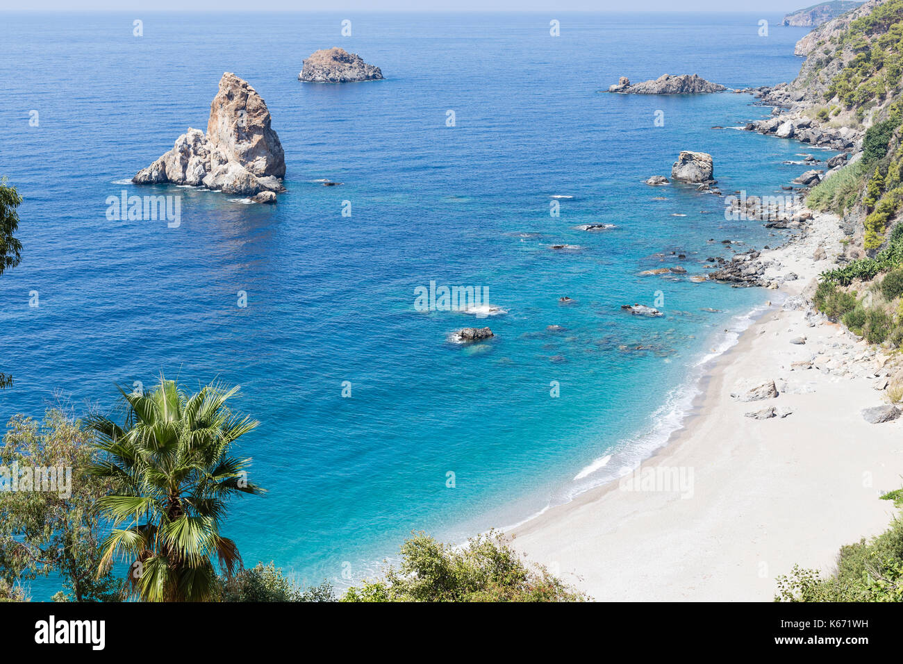 Beautiful picturesque beach with crystal clear water and rocks in the ...