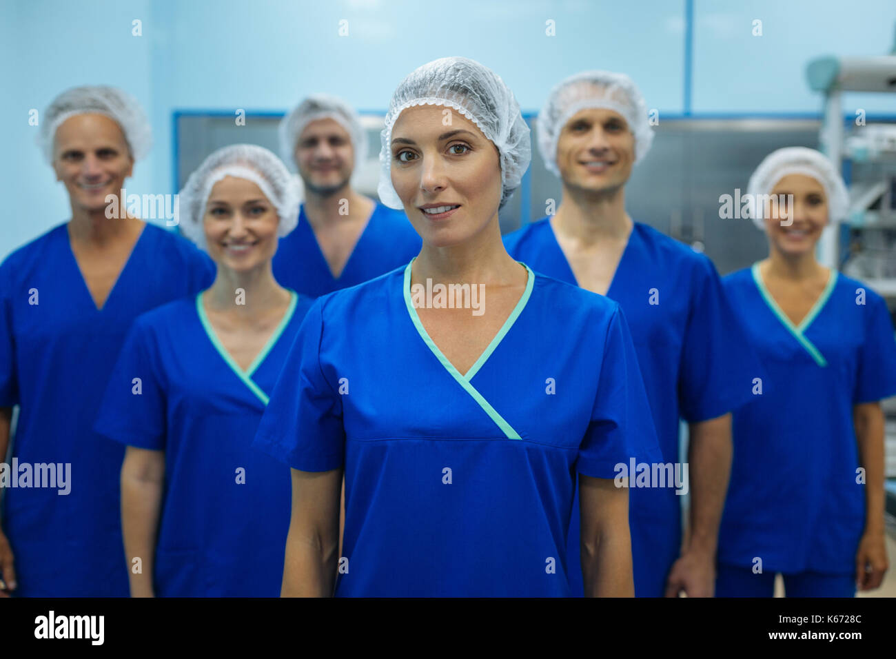 Attentive woman keeping smile on her face Stock Photo - Alamy