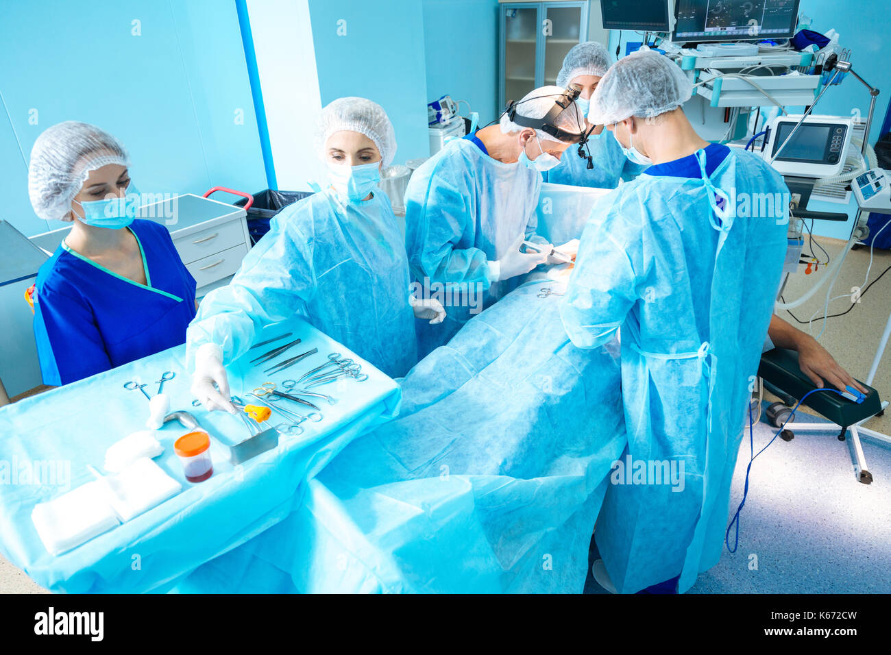 Healthcare workers treating patient hi-res stock photography and images ...