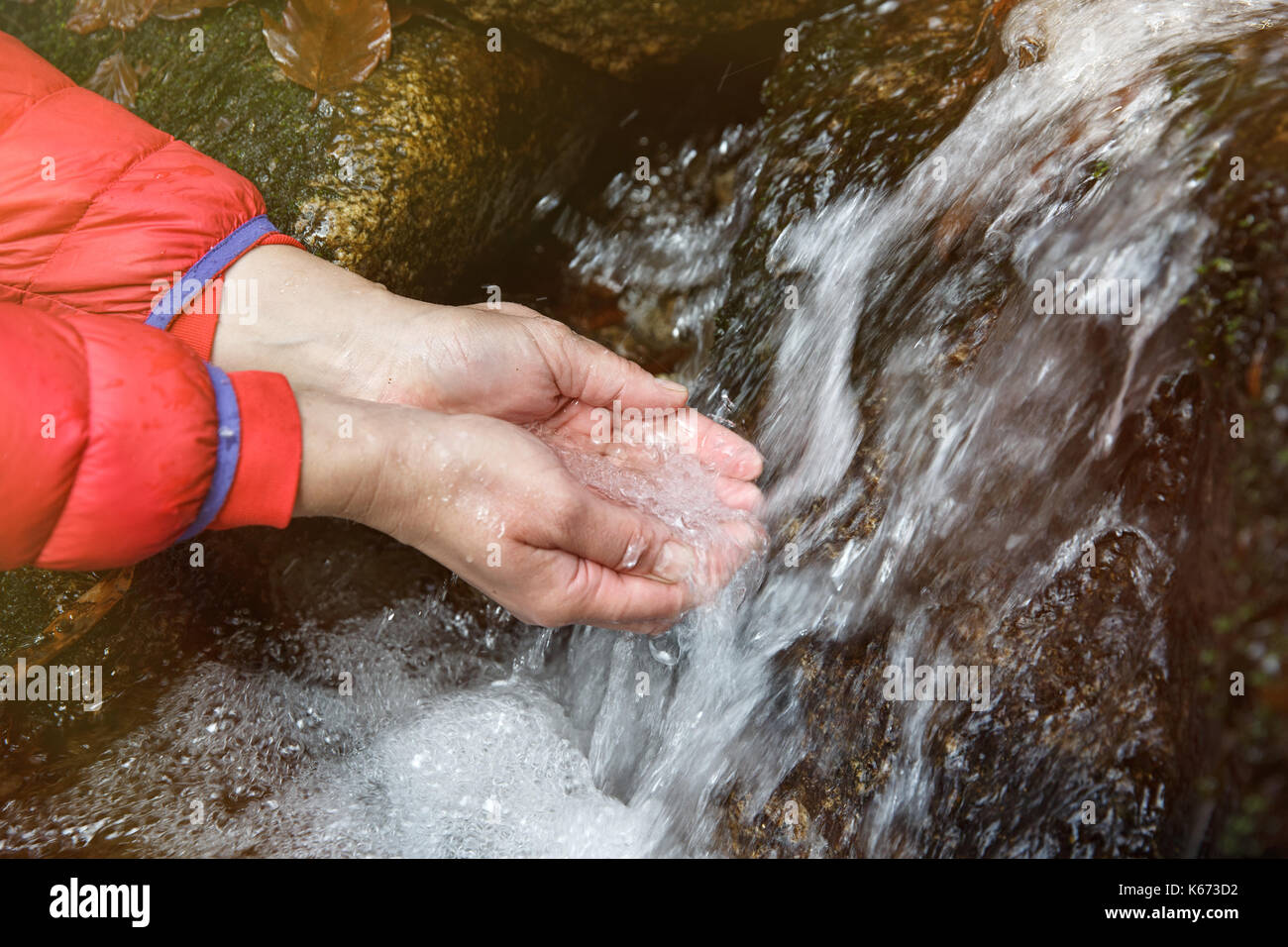 Hand in pure water spring hi-res stock photography and images - Alamy