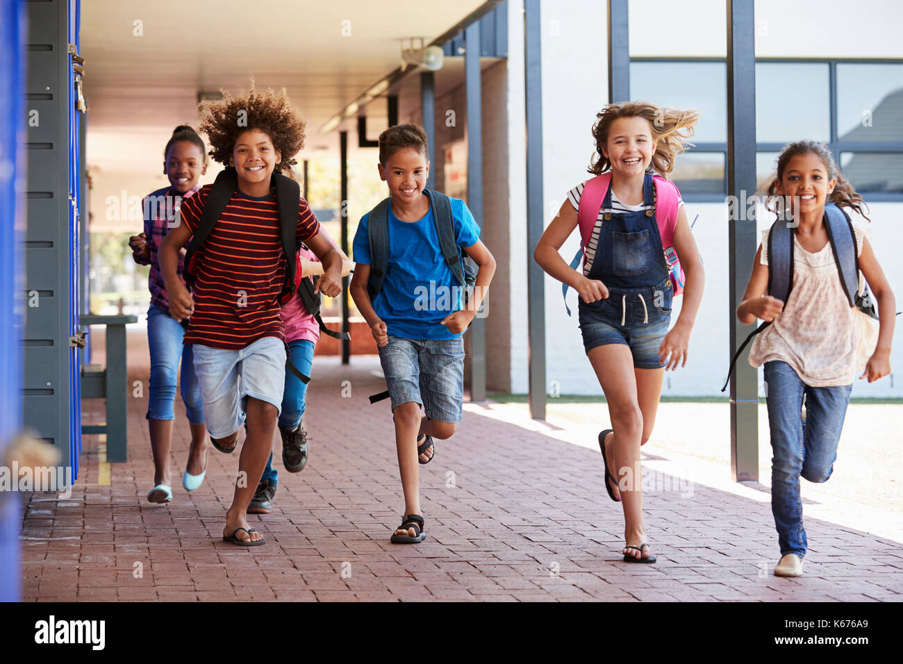 Kids Walking In School Hallway