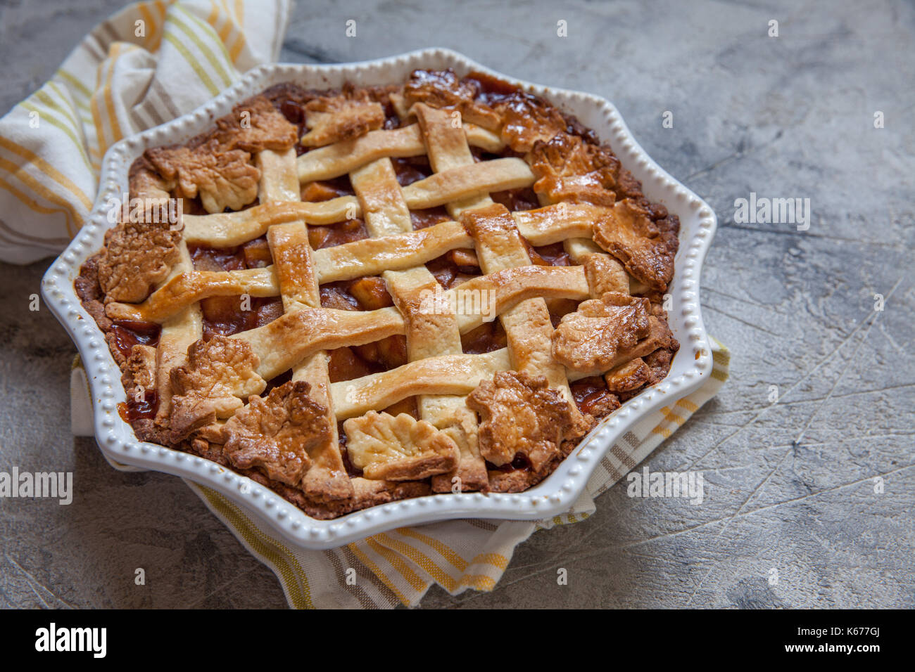 Traditional American Apple pie with fall autumn leaves food decoration ...