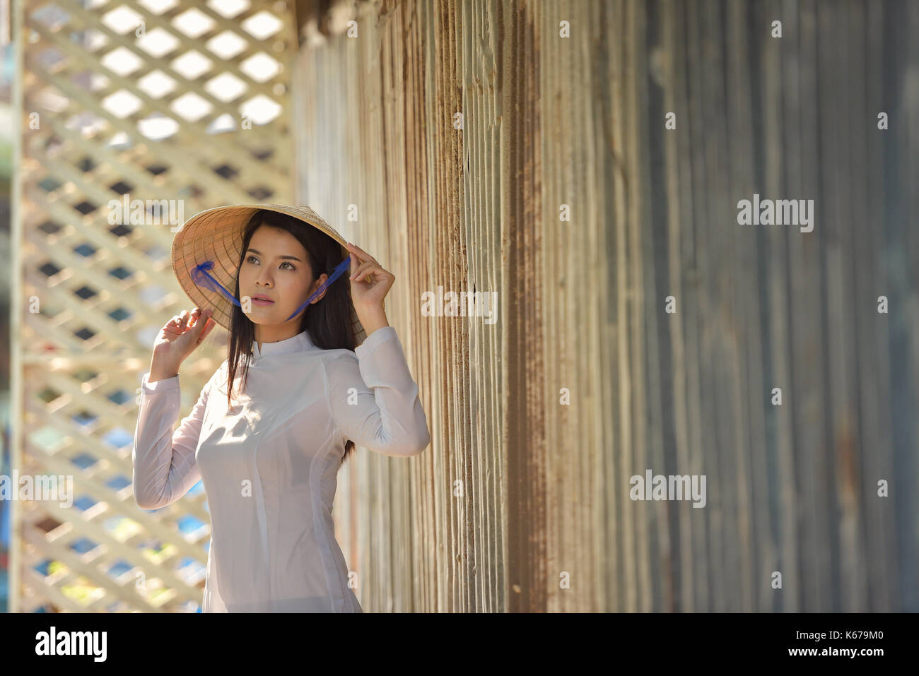 Woman wearing conical hat hi-res stock photography and images - Alamy