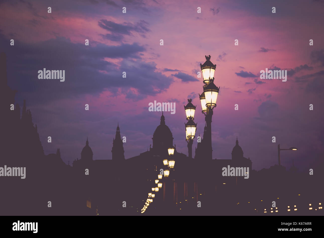 Illuminated street lamps at night, Barcelona, Spain Stock Photo - Alamy