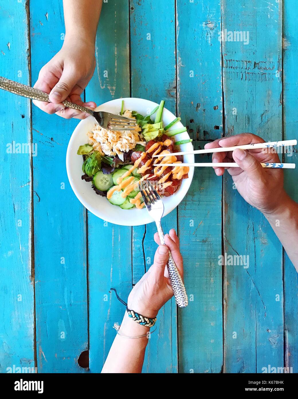 Child eating raw fish hi-res stock photography and images - Alamy