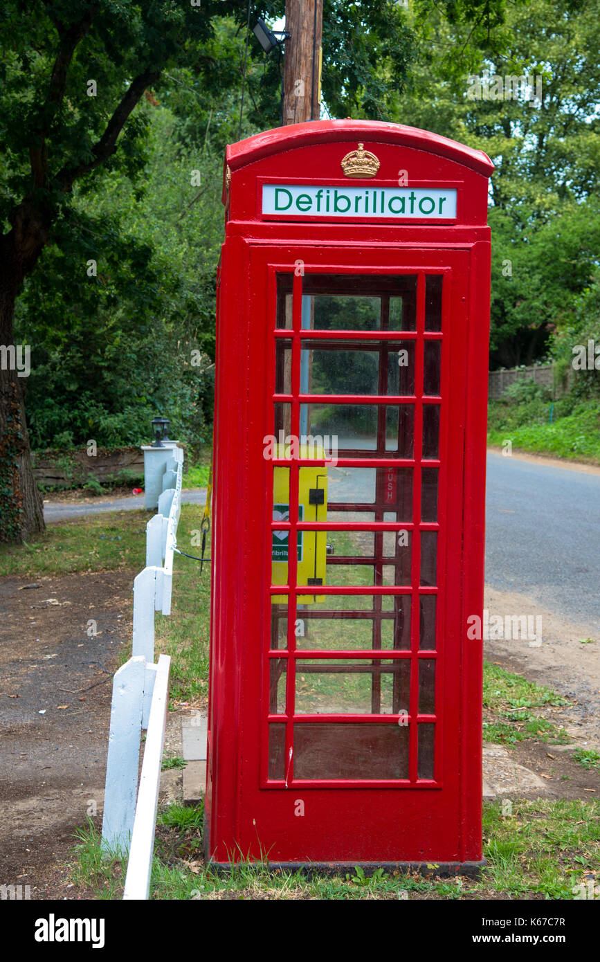 old fashioned red phonebooth in England Stock Photo - Alamy