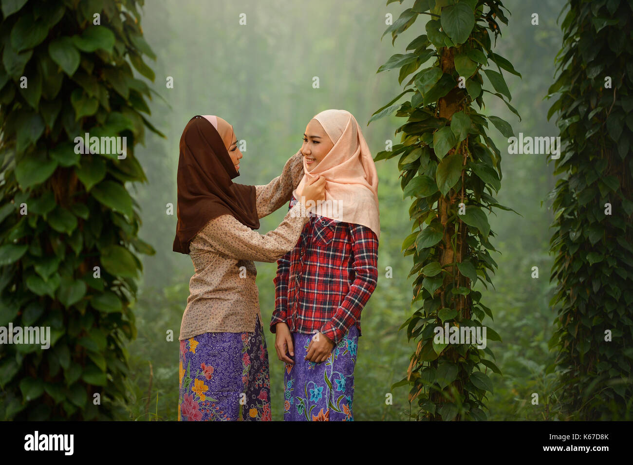 Two muslim women wearing hijab hi-res stock photography and images - Alamy