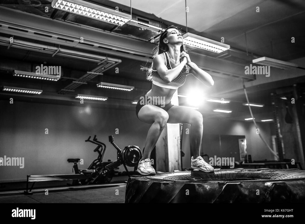 Fit young woman box jumping at a crossfit style Stock Photo - Alamy