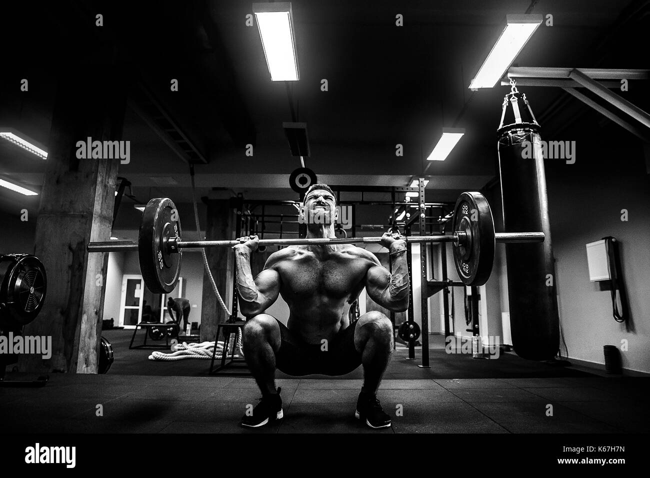 Man gym weights not woman Black and White Stock Photos & Images - Alamy