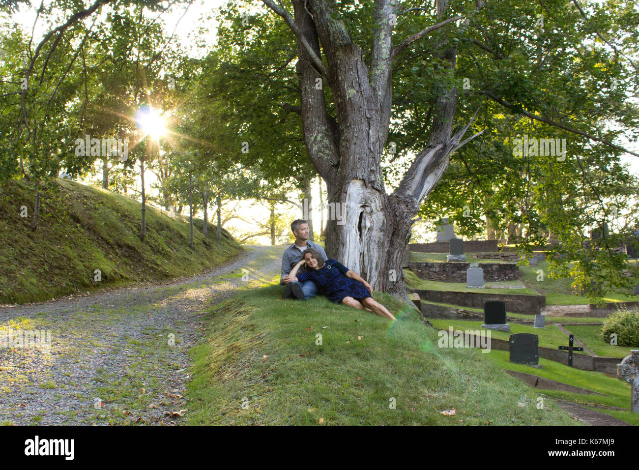 Man laying in lap in hi-res stock photography and images - Alamy
