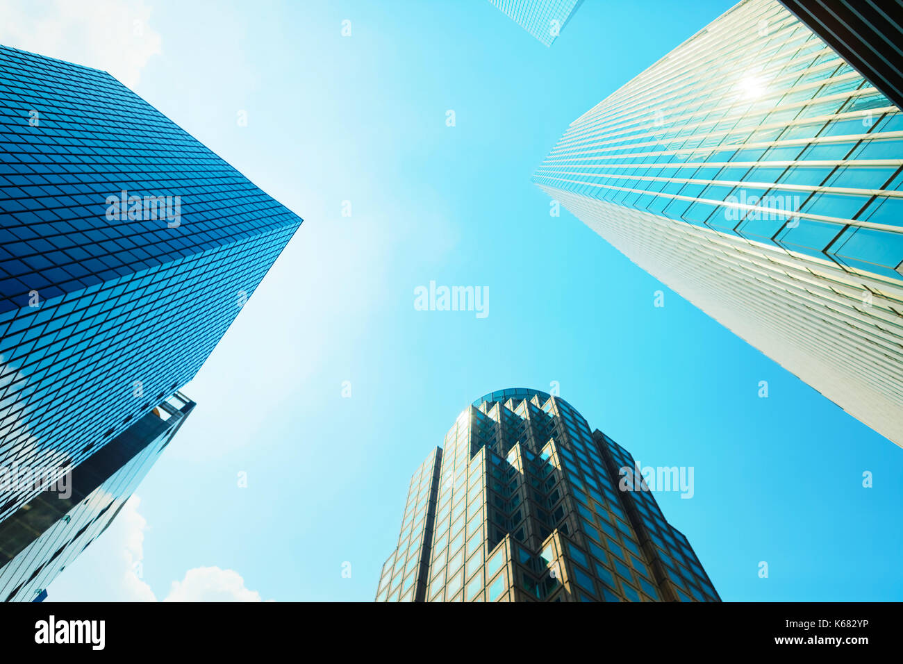 Skyscrapers as a symbol of success with blue sky above Stock Photo - Alamy