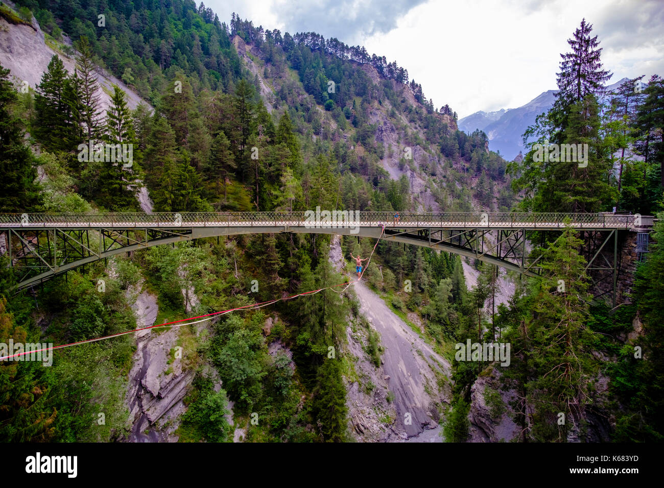 Man balancing on rope hi-res stock photography and images - Alamy