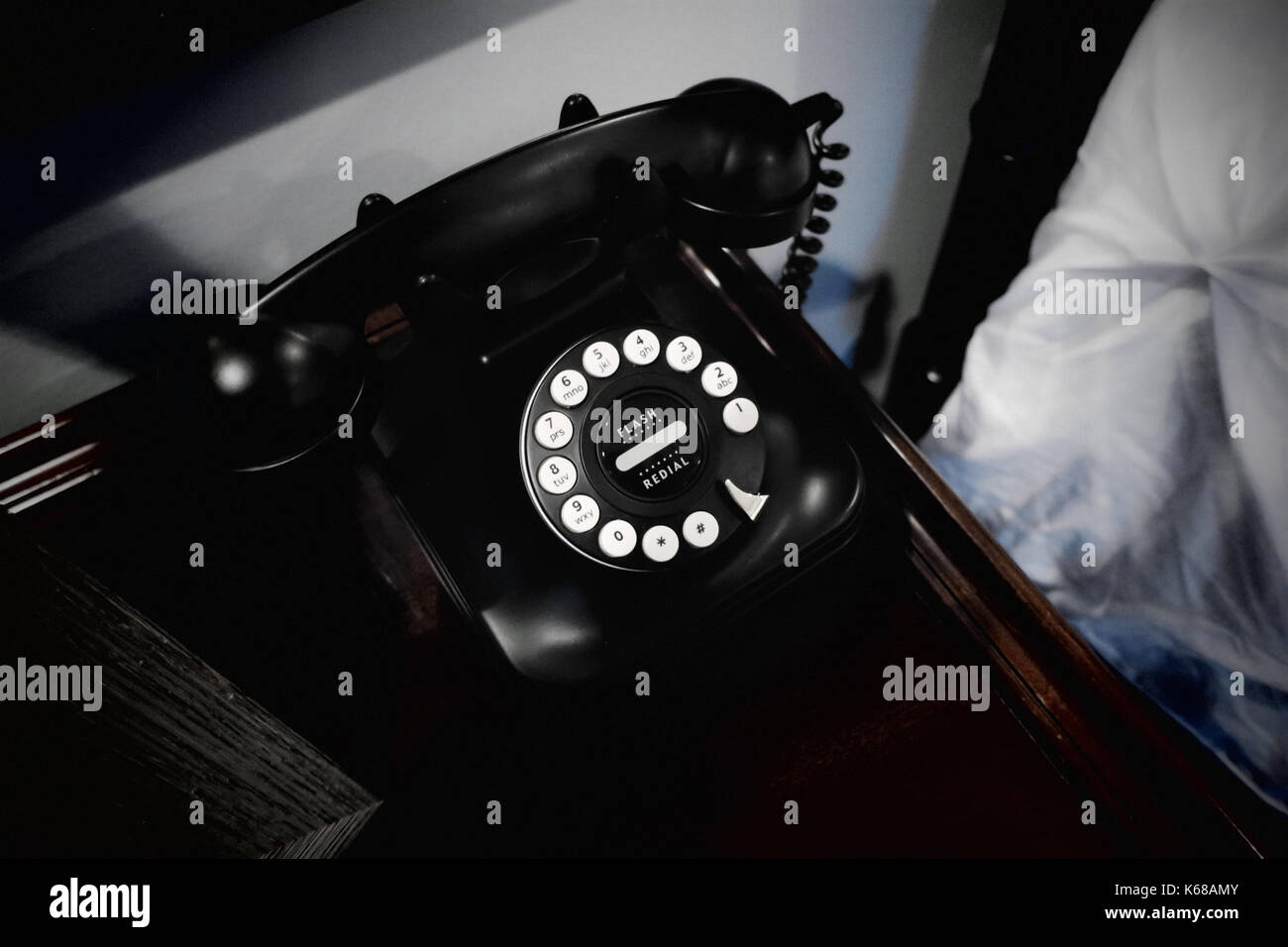A vintage telephone on a nightstand with effects Stock Photo - Alamy