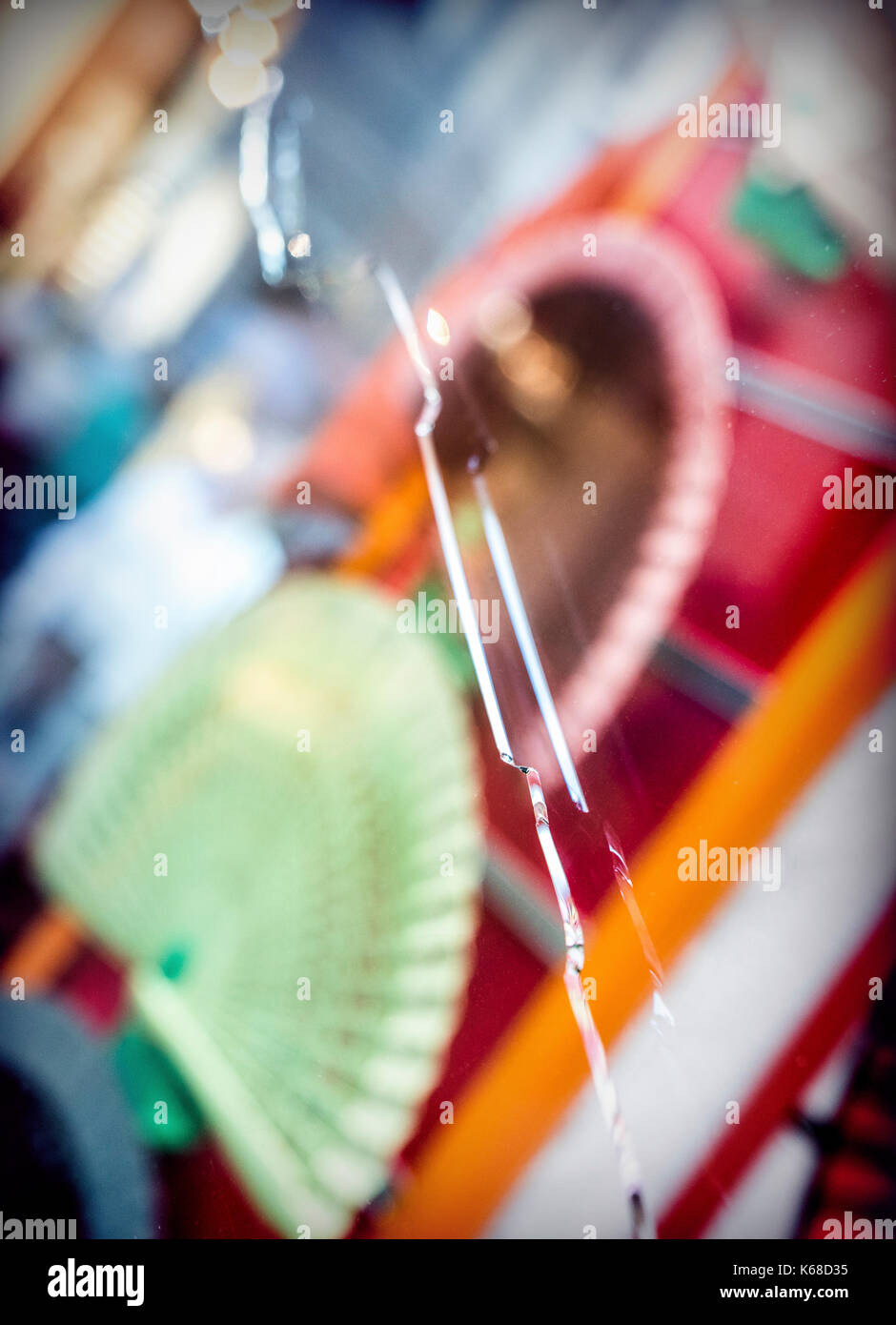 Showcase with broken glass, conceptual image Stock Photo - Alamy