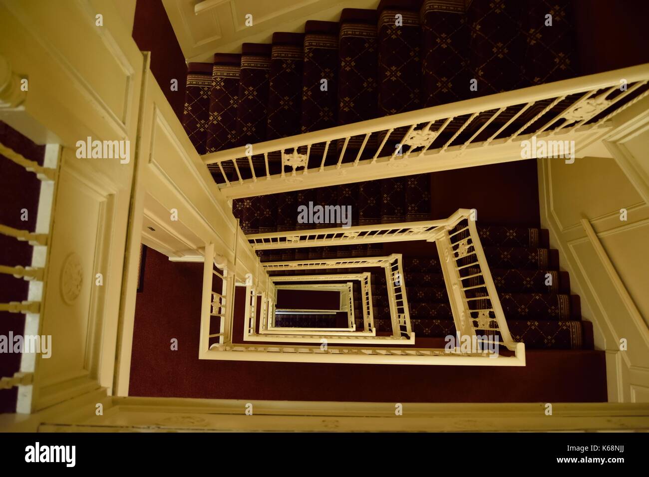 vertigo inducing staircase corridor Stock Photo - Alamy