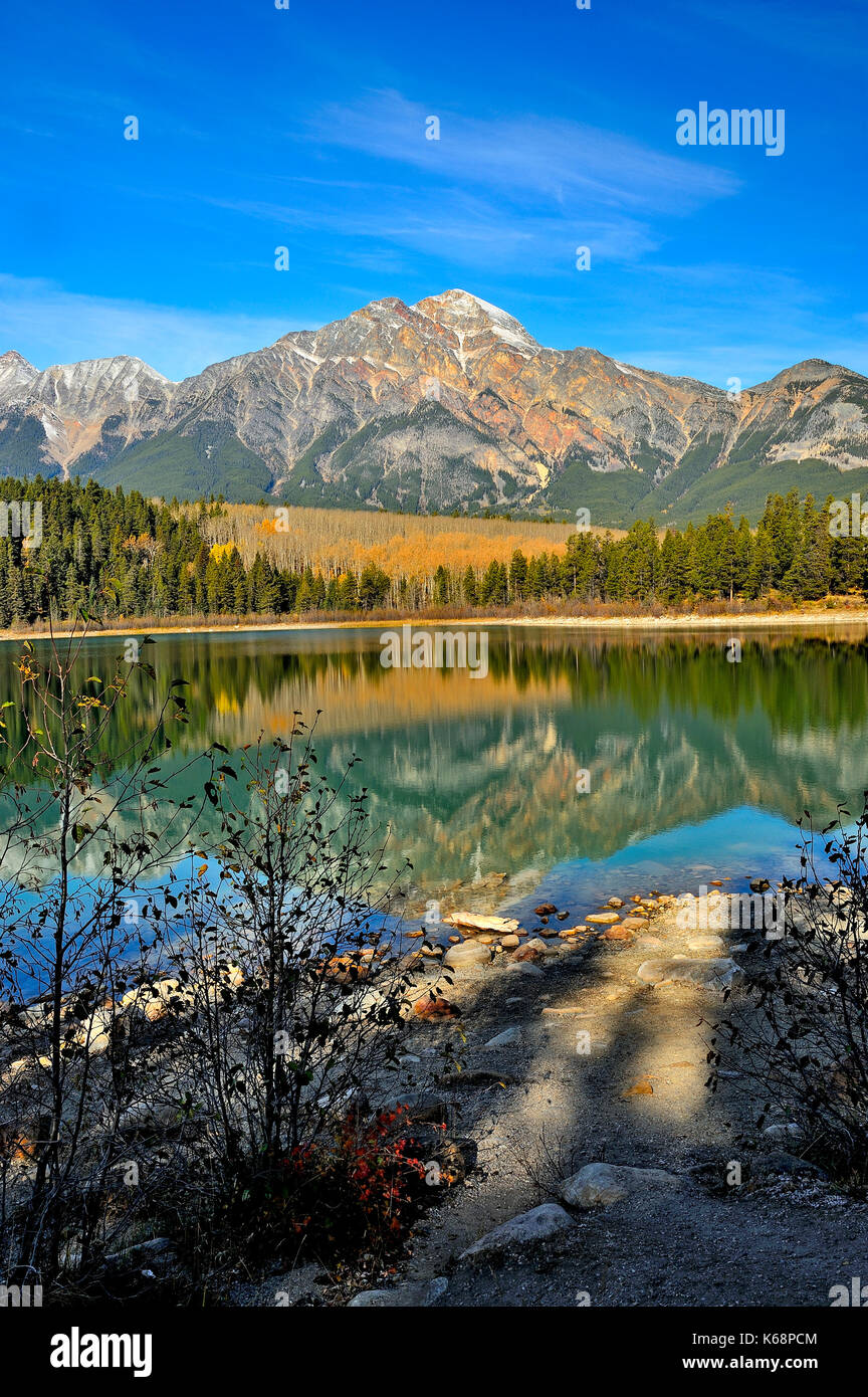 A vertical fall landscape image of Pyramid mountain in Jasper National ...