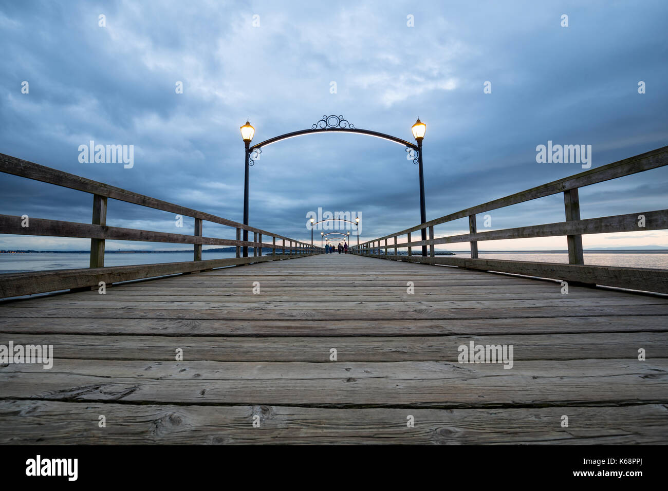 White Rock Pier Walk during a cloudy sunset. Picture taken in Vancouver ...