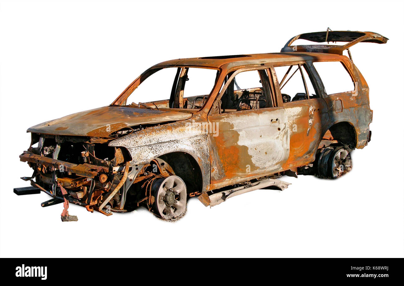 Photo illustration of a burned and rusted out car Stock Photo - Alamy