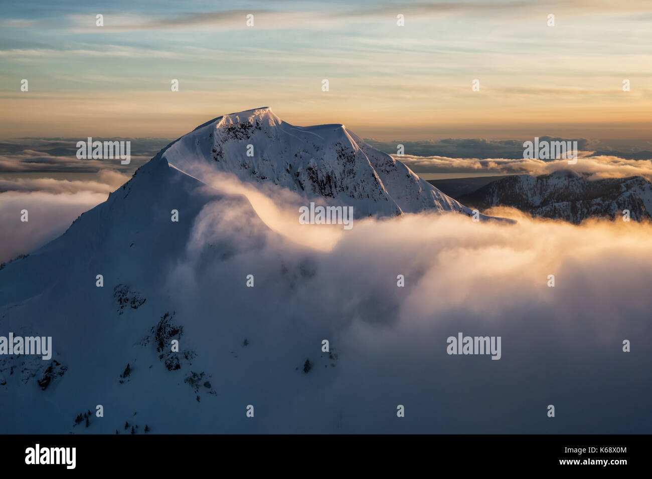 Aerial Landscape View Mt Wrottesley covered in snow during a beautiful ...