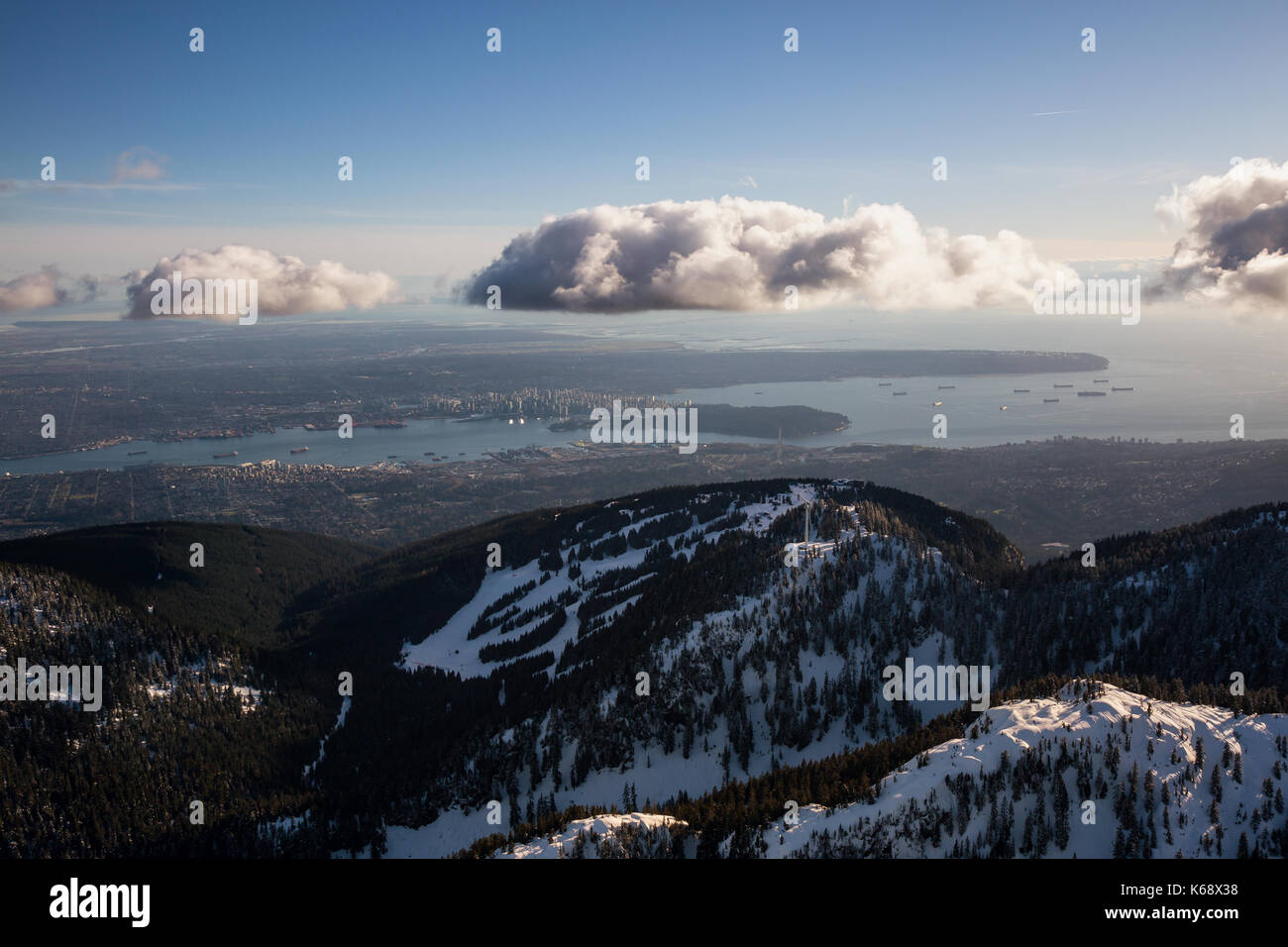 Aerial view of Grouse Mountain and Vancouver Downtown City, BC, Canada ...
