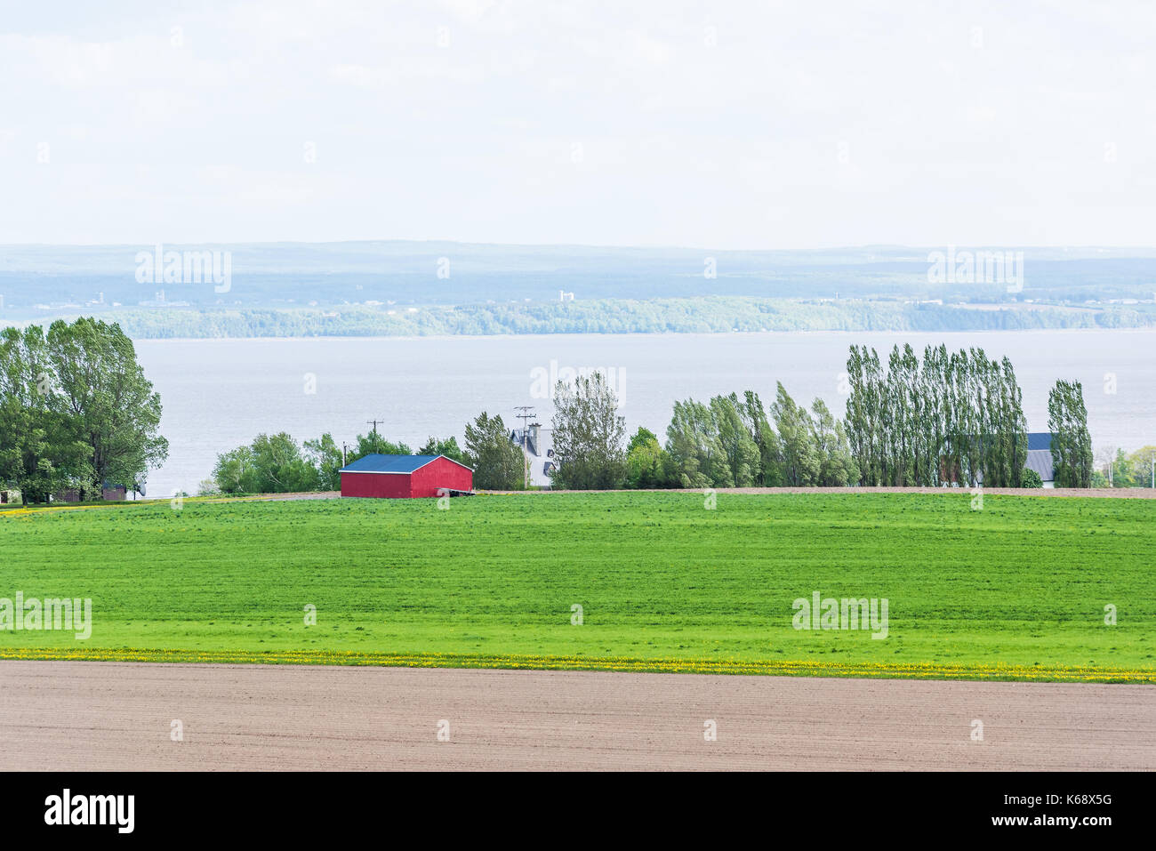 Aerial cityscape landscape view of farmland in Ile D'Orleans, Quebec ...
