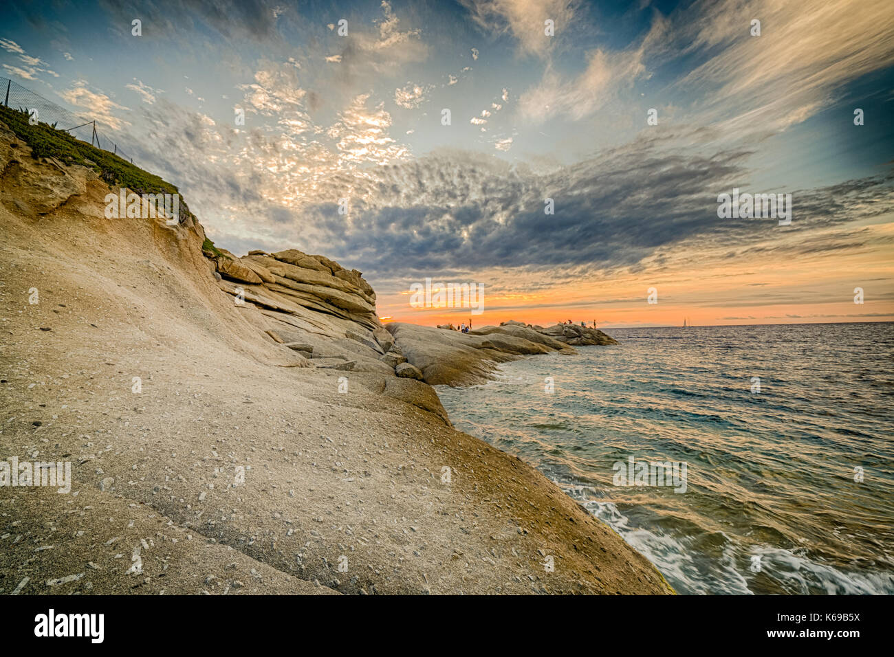 Scenic coastal sunset with orange light on island of Elba Stock Photo ...