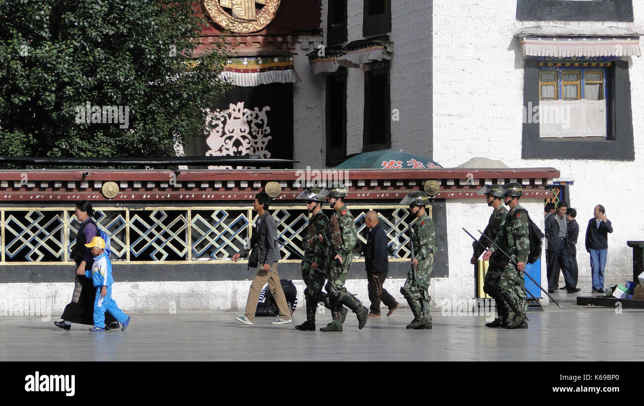 Tibet, China - Sep 7, 2012. Chinese soldiers walking around Jokhang ...