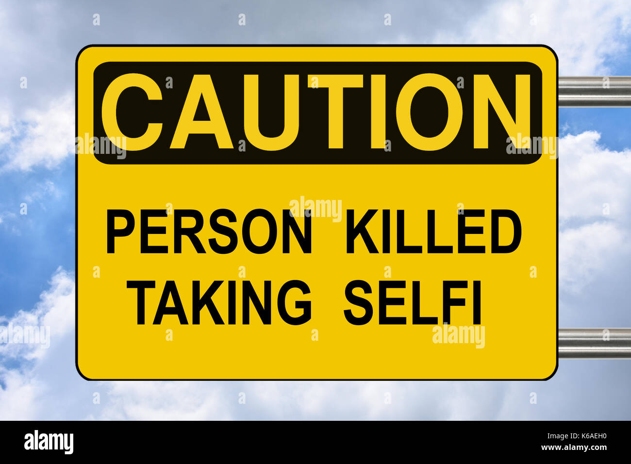 Person killed taking selfi, yellow road warning sign Stock Photo - Alamy