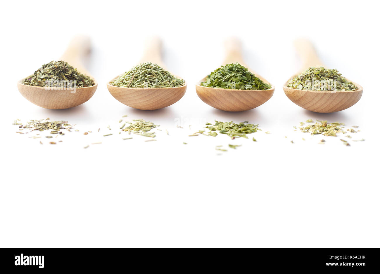 Parsley on wooden spoon Cut Out Stock Images & Pictures - Alamy