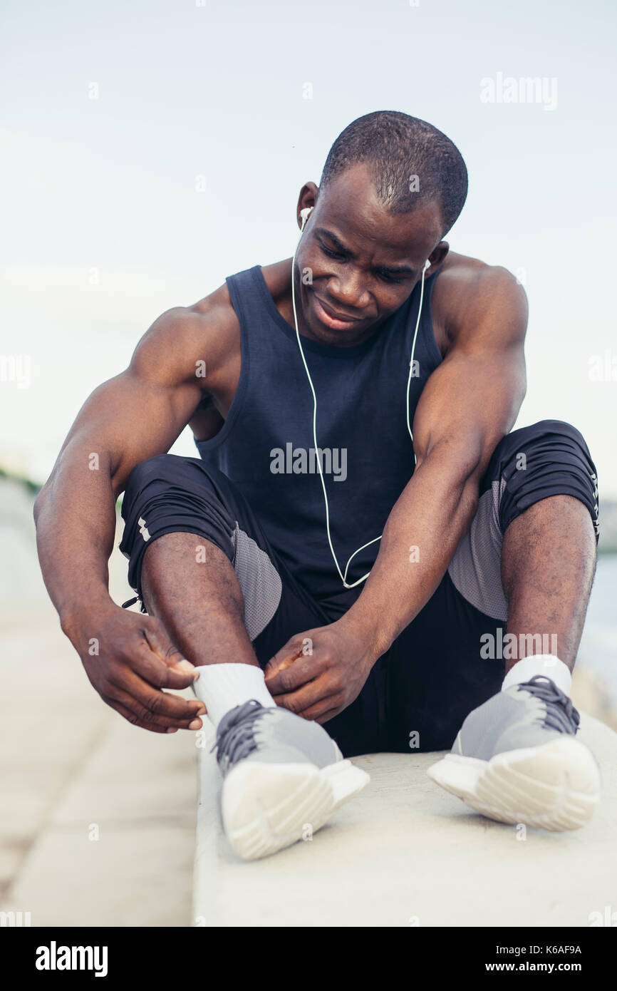 Young Sport man resting after workout exercise Stock Photo - Alamy