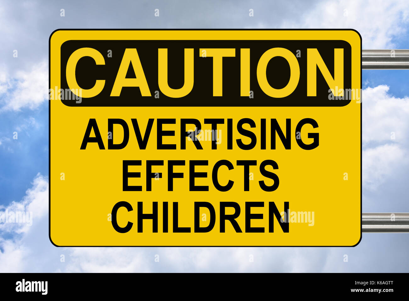 Advertising effects on children, yellow warning road sign Stock Photo ...