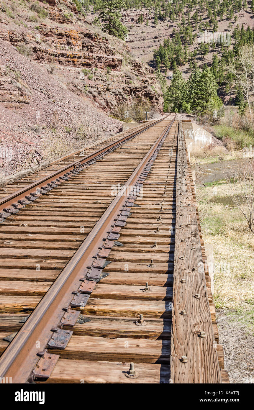 Railroad tracks curve just as they disappear from sight after they ...