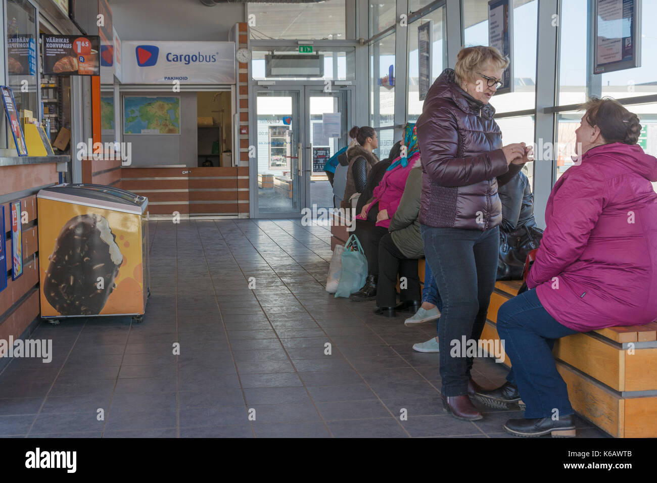 Passengers sitting in waiting room hi-res stock photography and images ...