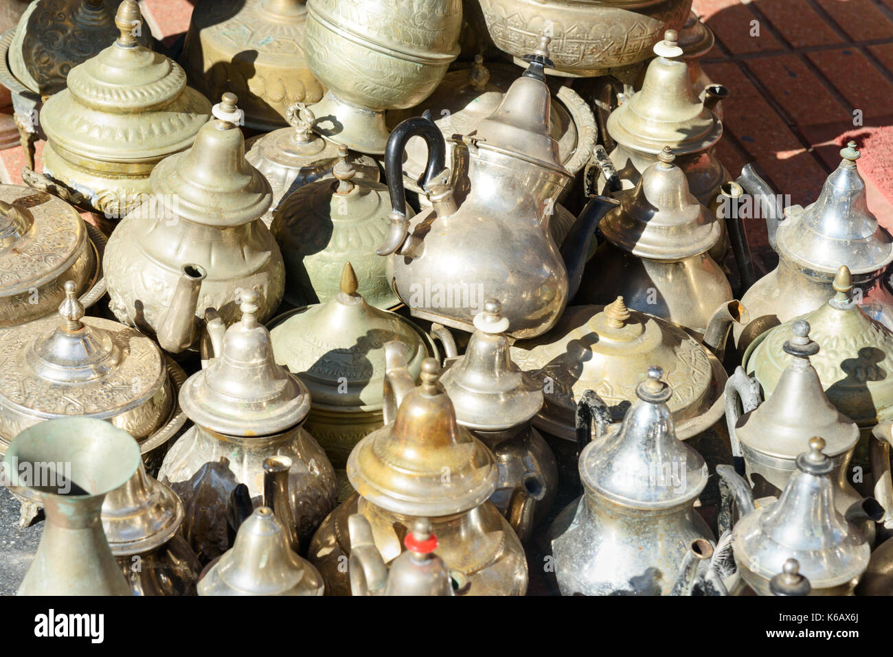 Traditional Arab kettles for tea for sale on the street market in ...
