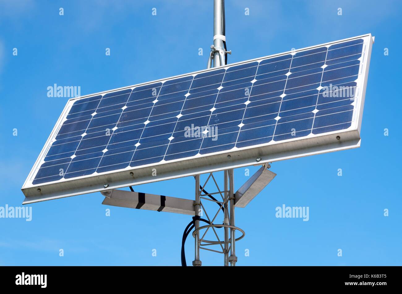 closeup of a small photovoltaic panel for renewable electric energy ...