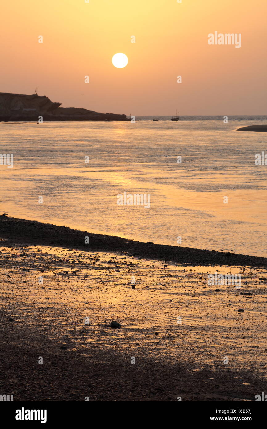 Sunset at Sunehra Beach, Balochistan Stock Photo - Alamy