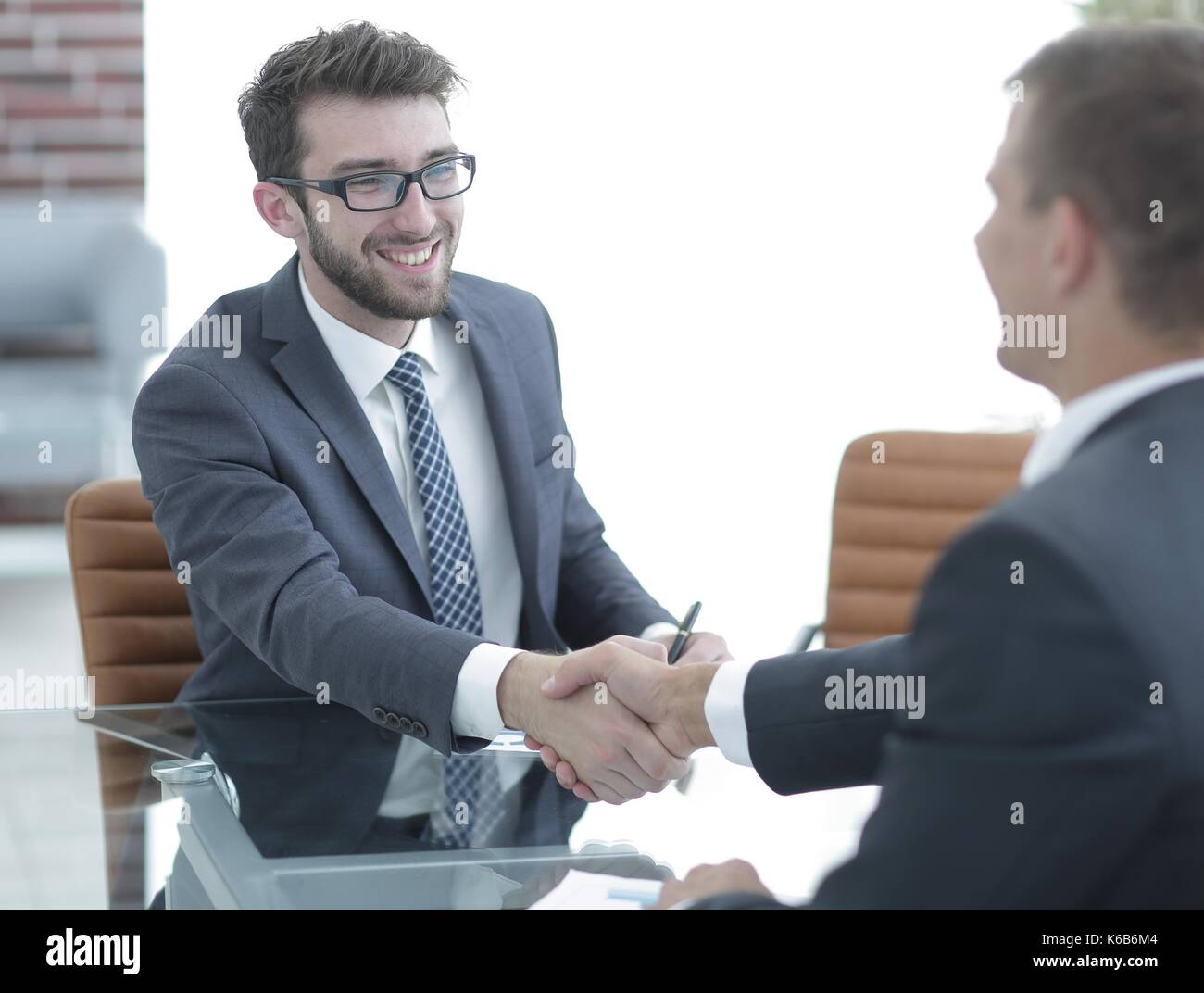 welcome and handshake business partners Stock Photo - Alamy