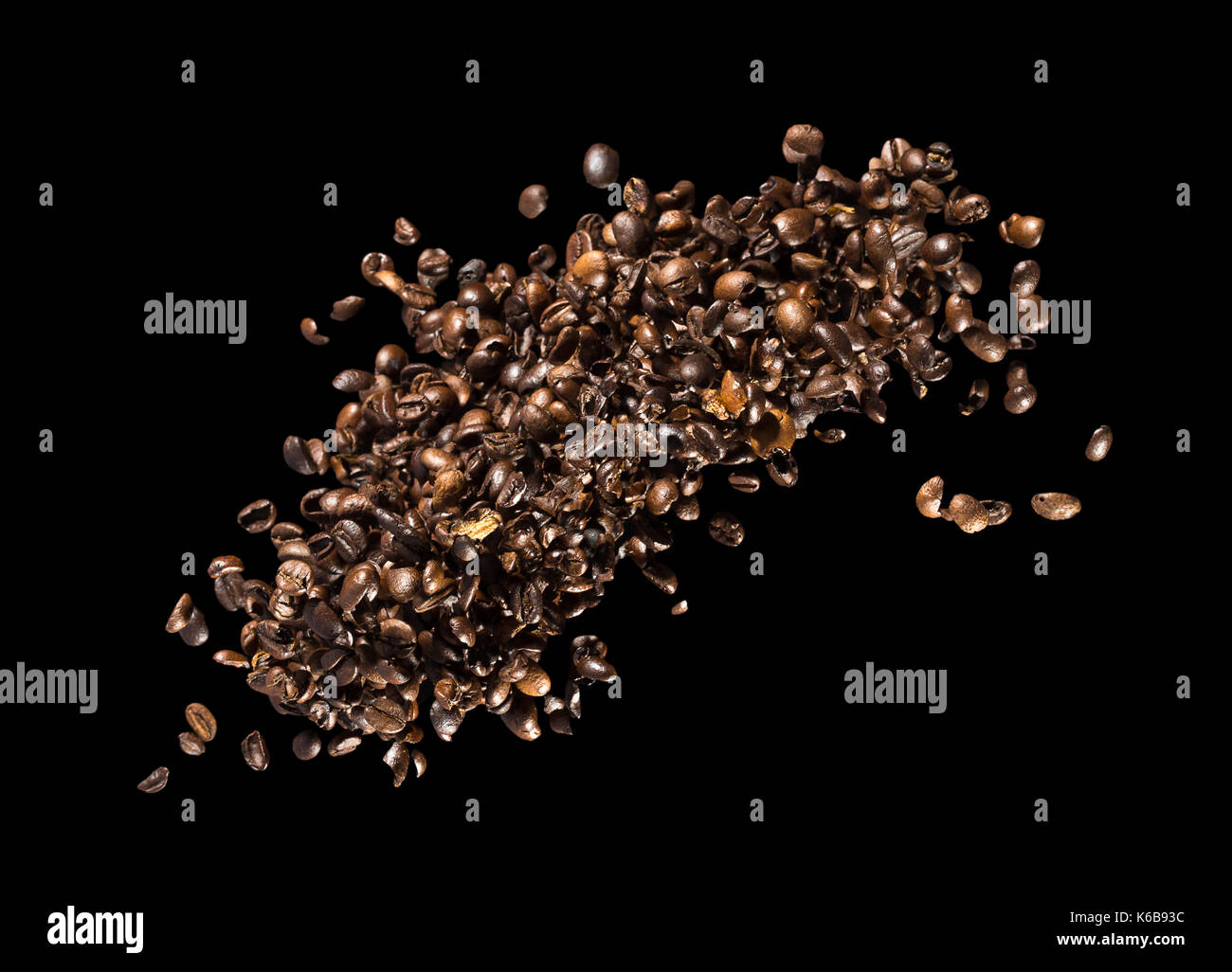falling coffee beans on black background Stock Photo - Alamy