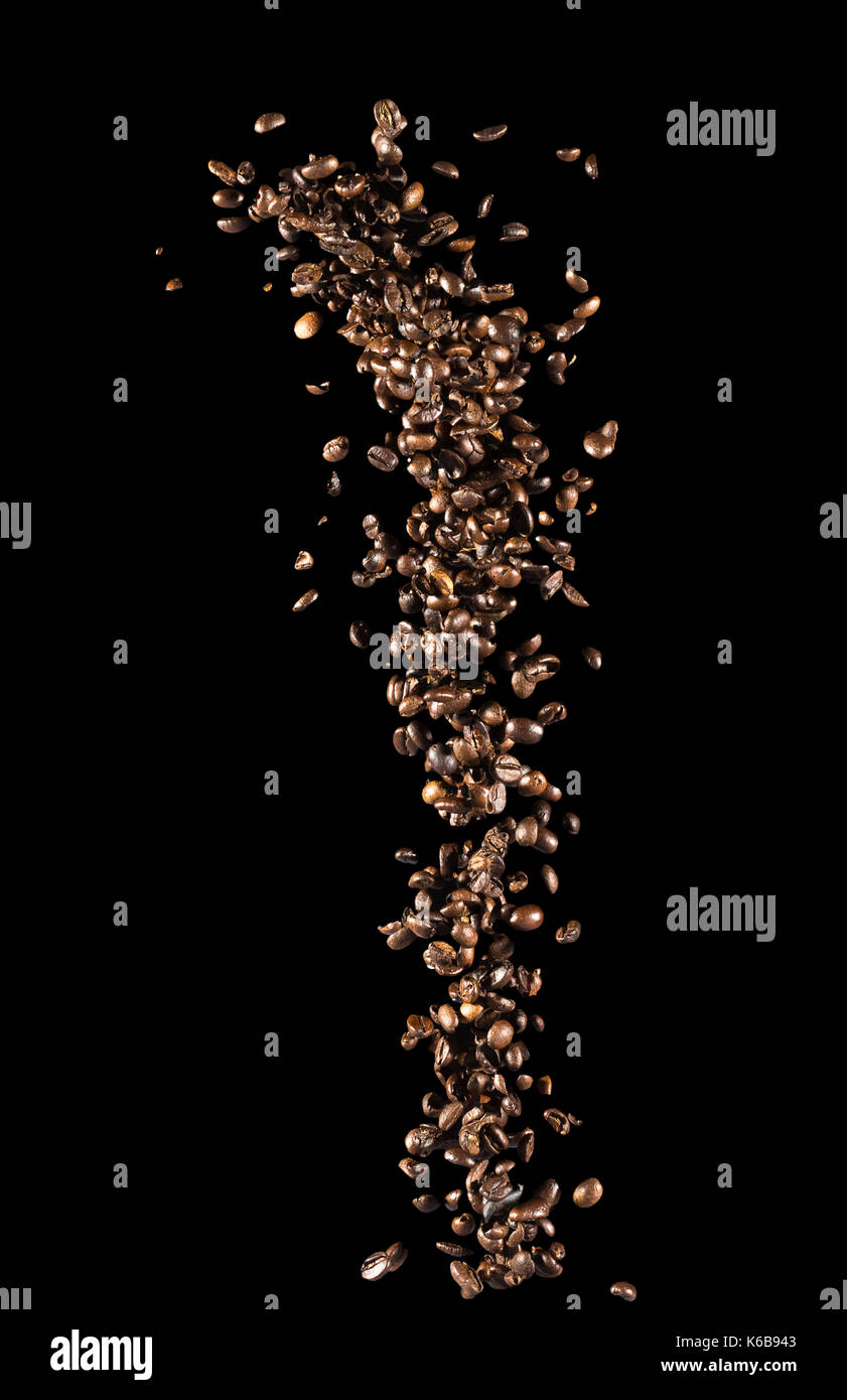 falling coffee beans on black background Stock Photo - Alamy